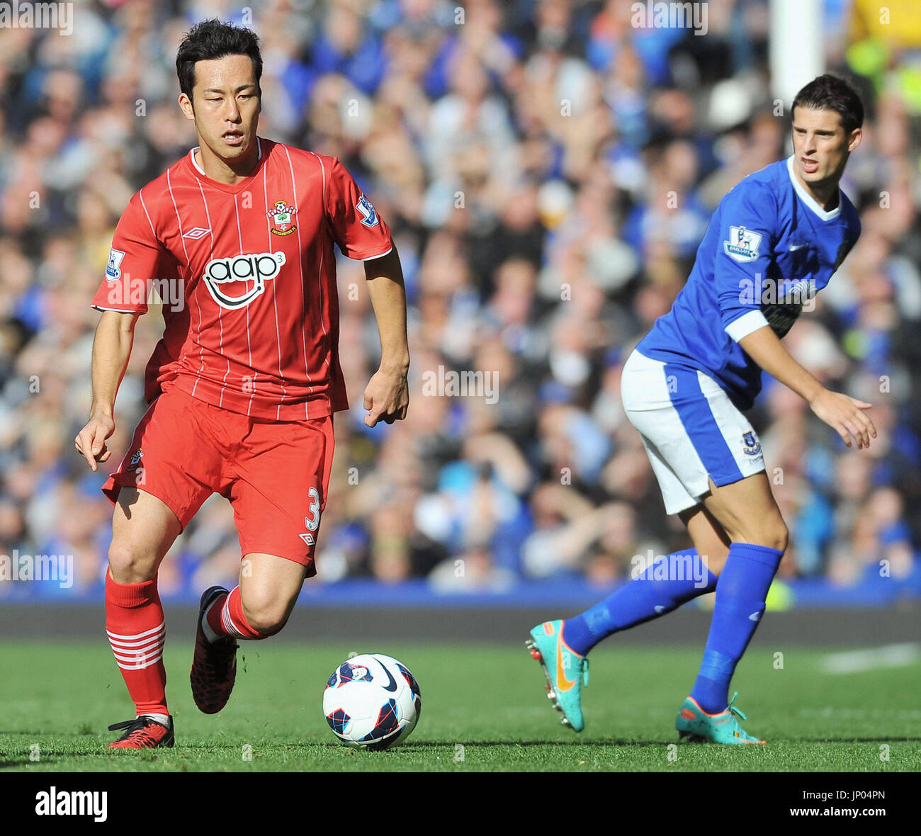 LIVERPOOL, Britain - Japan's London Olympic captain Maya Yoshida (L) of ...
