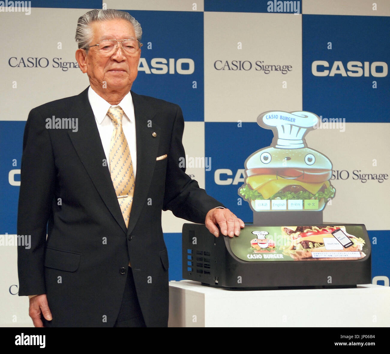 TOKYO, Japan - Kazuo Kashio, president of Casio Computer Co., unveils ...