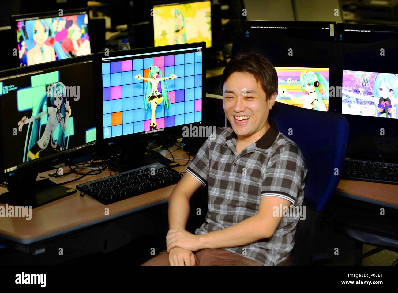 TOKYO, Japan - Graphics designer Atsushi Wakamura smiles in Tokyo on ...