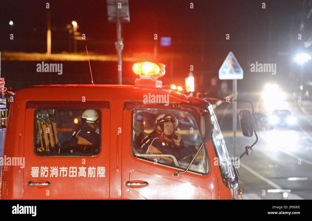 RIKUZENTAKATA, Japan - Firefighters call for evacuation from coastal ...