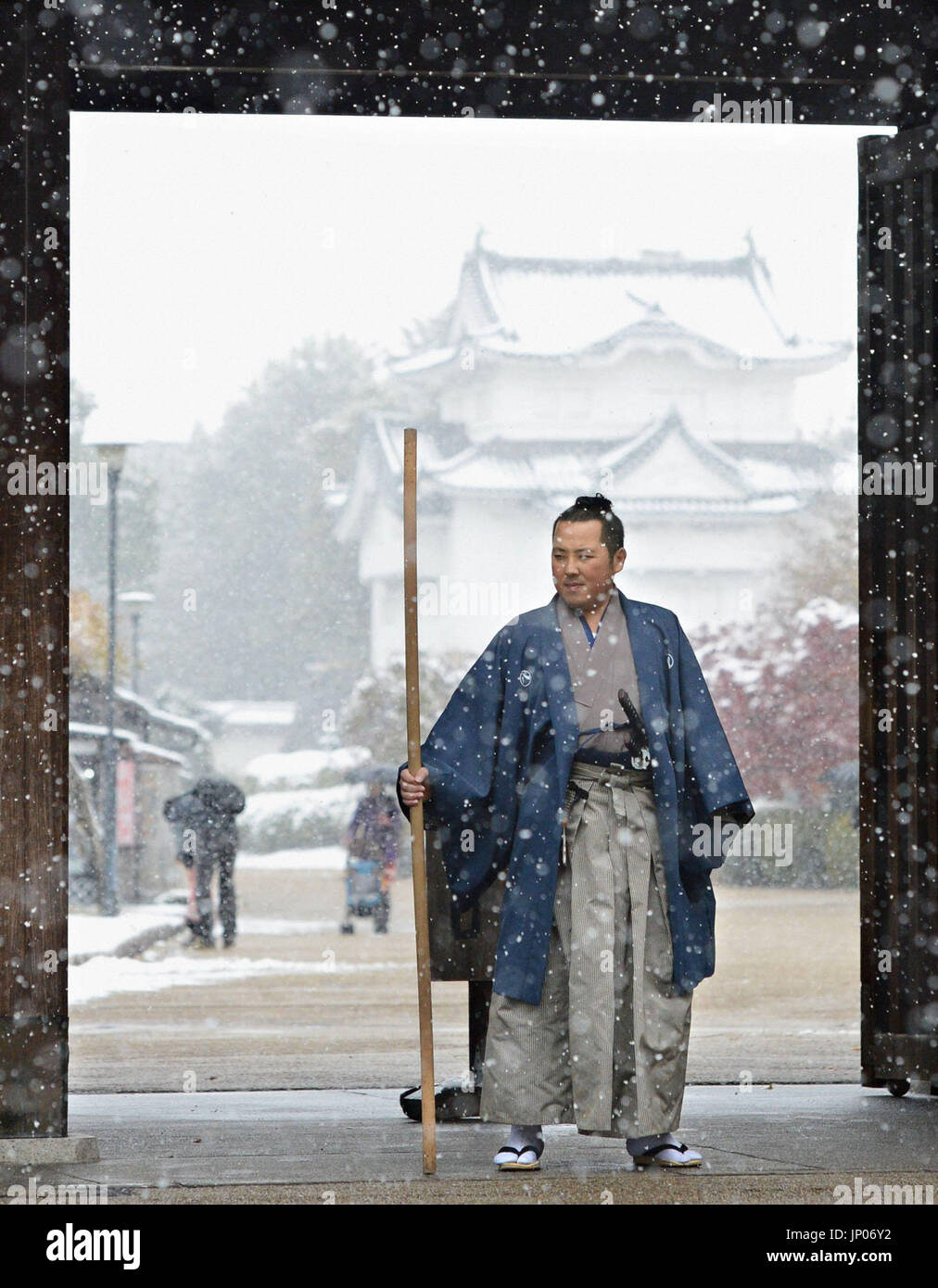 NAGOYA, Japan - Dressed as a samurai, a gatekeeper at Nagoya castle is ...
