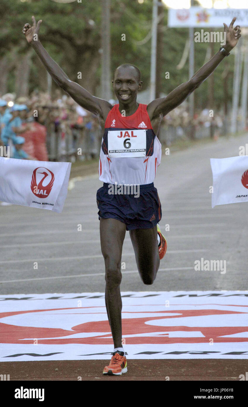 HONOLULU, United States - Kenya's Wilson Kipsang crosses the finish ...