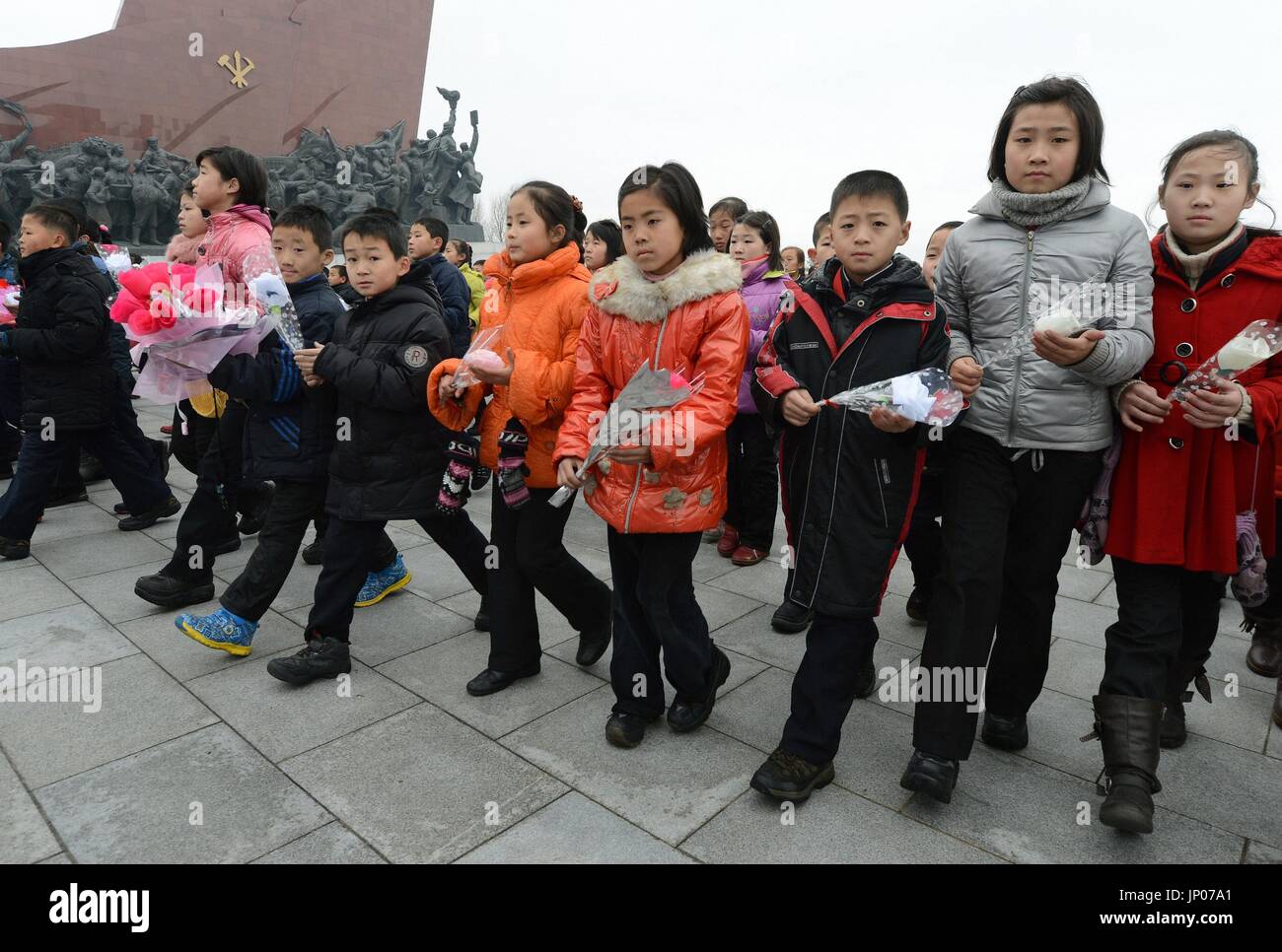 PYONGYANG, North Korea - Photo shows children near bronze statues of ...