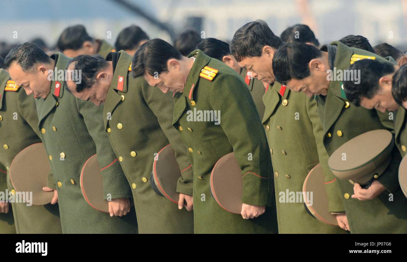 PYONGYANG, North Korea - North Korean military officers offer a moment ...
