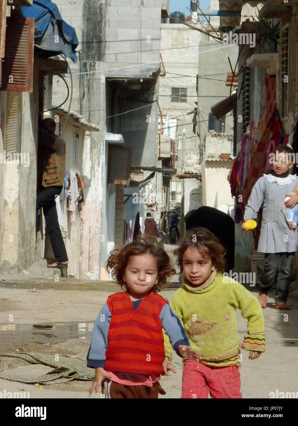 GAZA, Palestinian Authority - Children play at a refugee camp in the ...