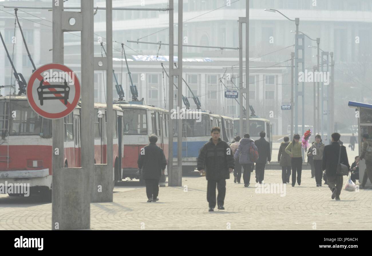 PYONGYANG, North Korea - Photo shows trolleybuses and pedestrians in ...