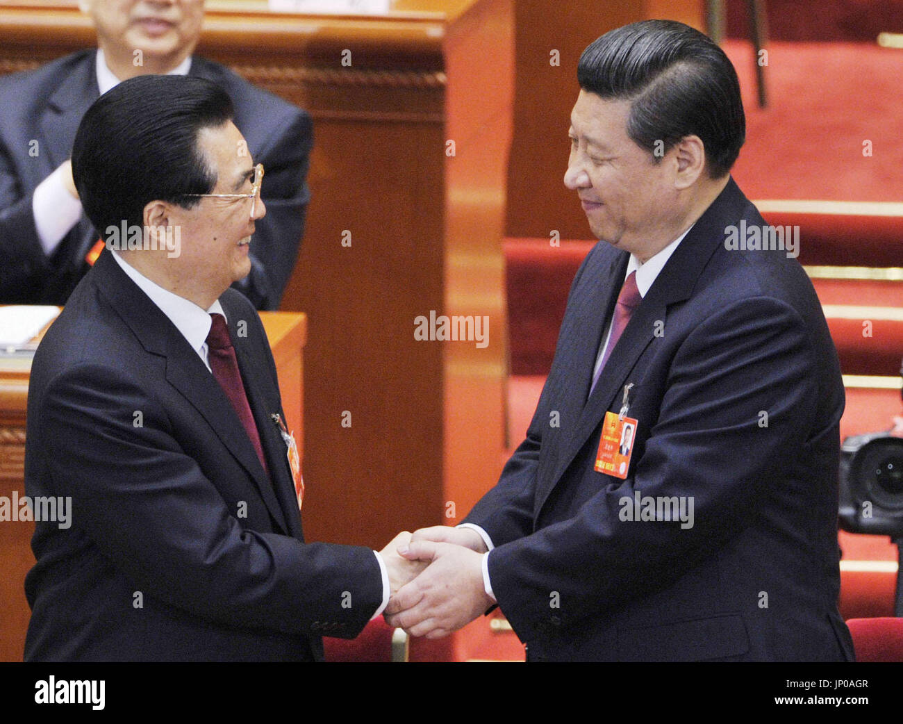 BEIJING, China - Newly elected Chinese President Xi Jinping (R) shakes ...