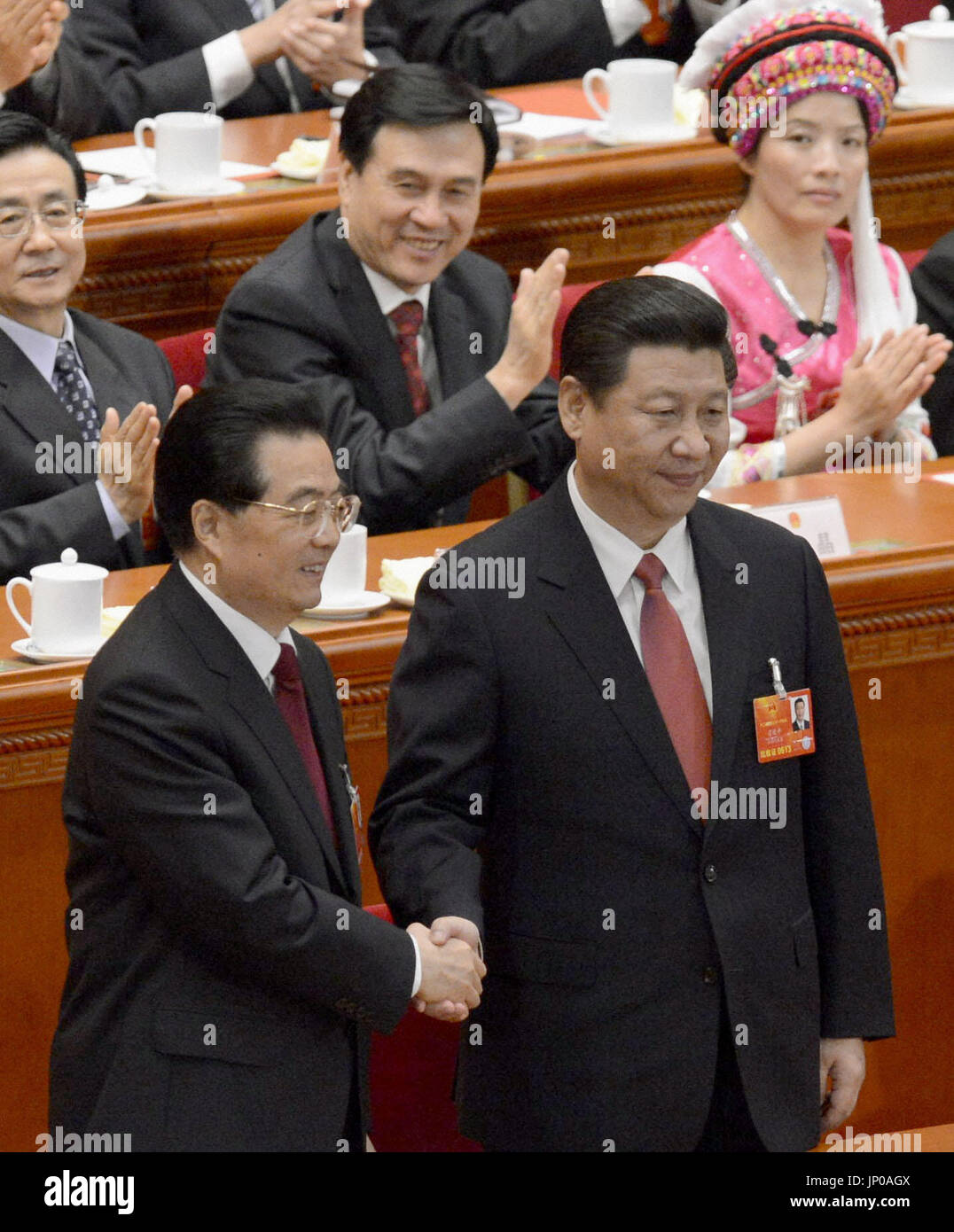 BEIJING, China - Newly elected Chinese President Xi Jinping (R) shakes ...