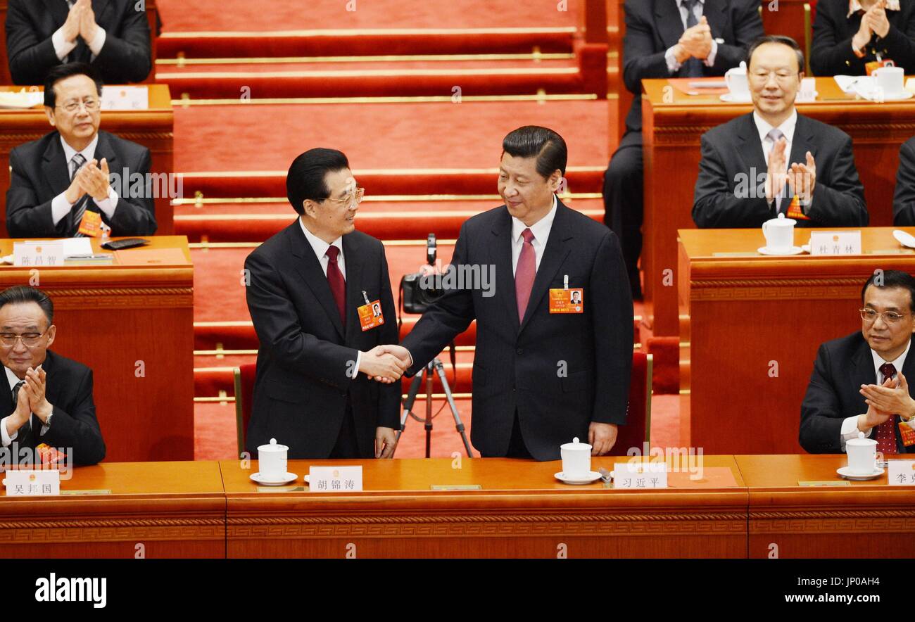 BEIJING, China - Newly elected Chinese President Xi Jinping (R) shakes ...