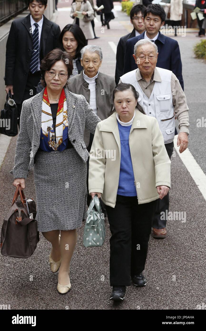 TOKYO, Japan - Takumi Nagoya (front R), the 50-year-old plaintiff ...