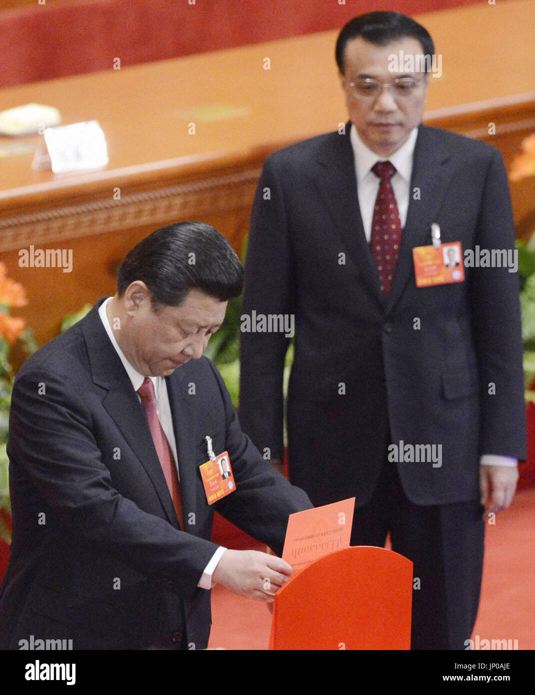 BEIJING, China - Chinese Communist Party chief Xi Jinping (front) votes ...
