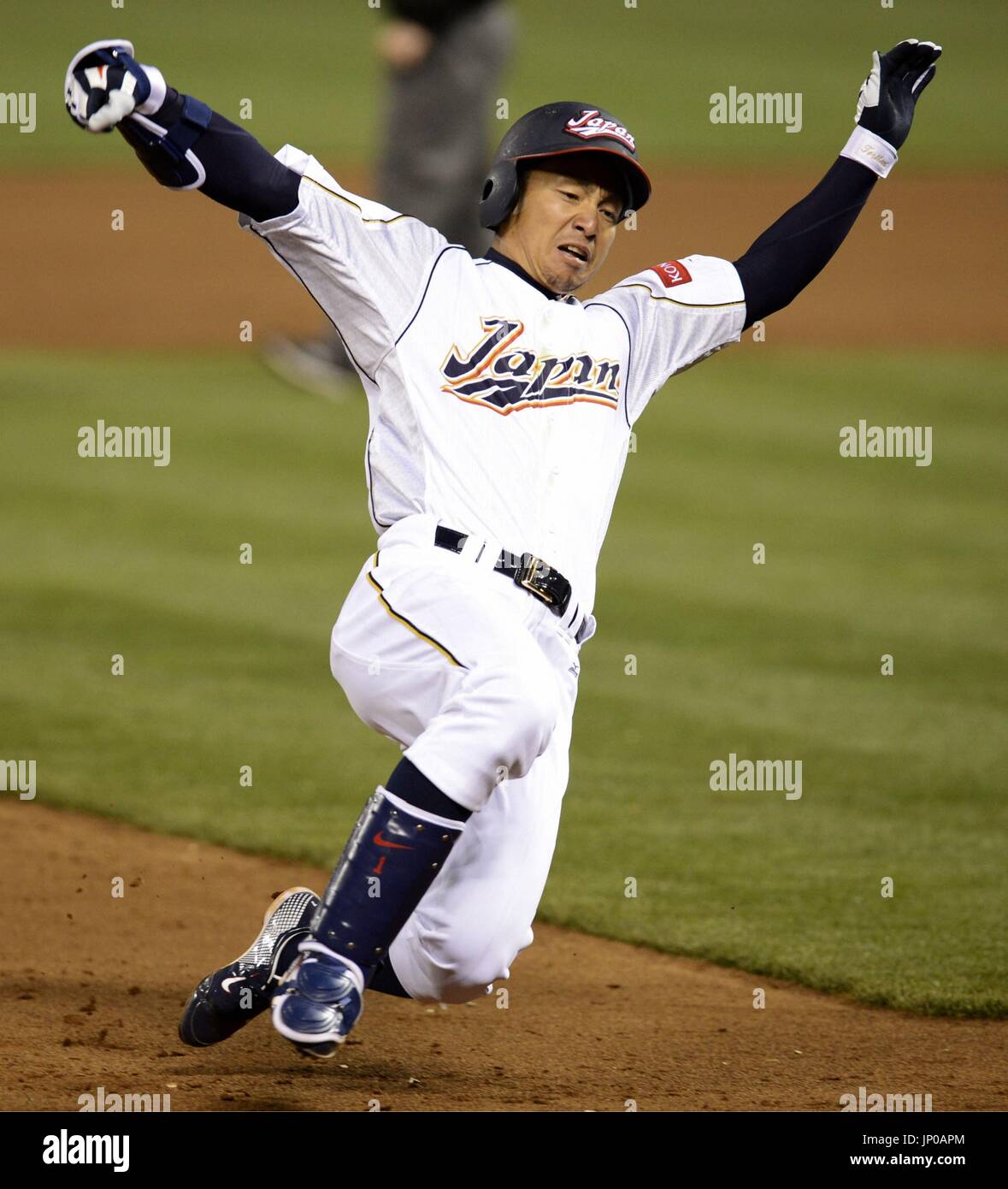 SAN FRANCISCO, United States - Takashi Toritani of Japan slides into ...
