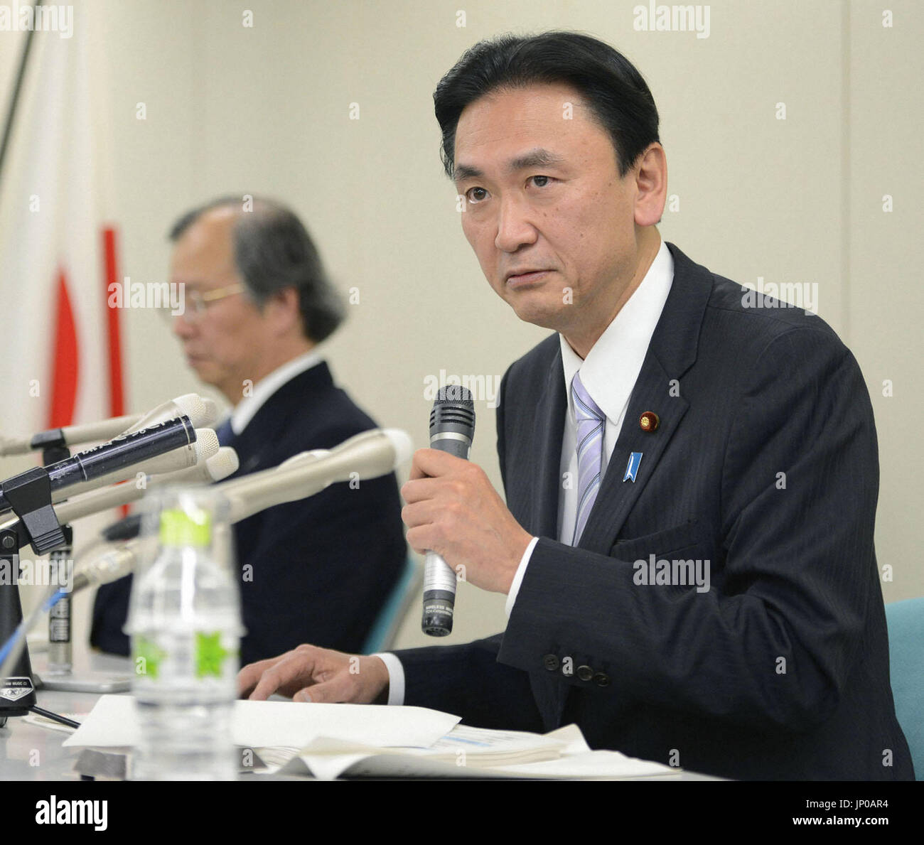 TOKYO, Japan - Antidisaster minister Keiji Furuya holds a press ...