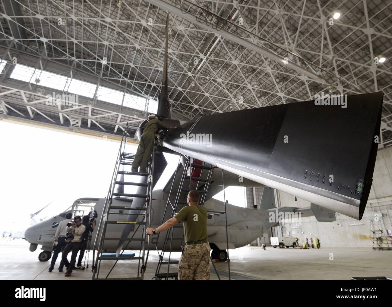 FUKUOKA, Japan - Photo shows a huge propeller undergoing maintenance as ...