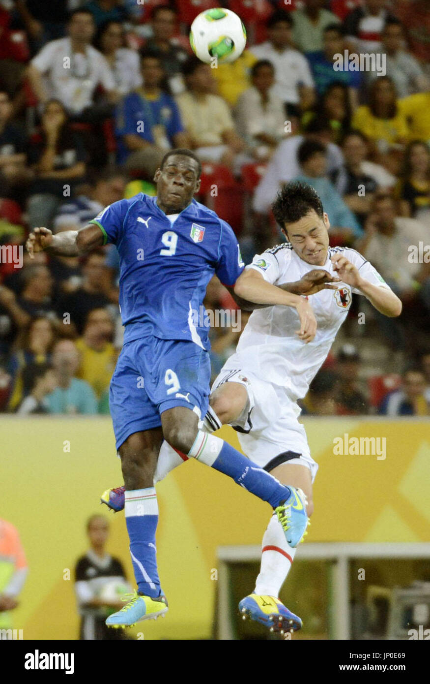 RECIFE, Brazil - Italy's Mario Balotelli (L) and Japan's Maya Yoshida ...