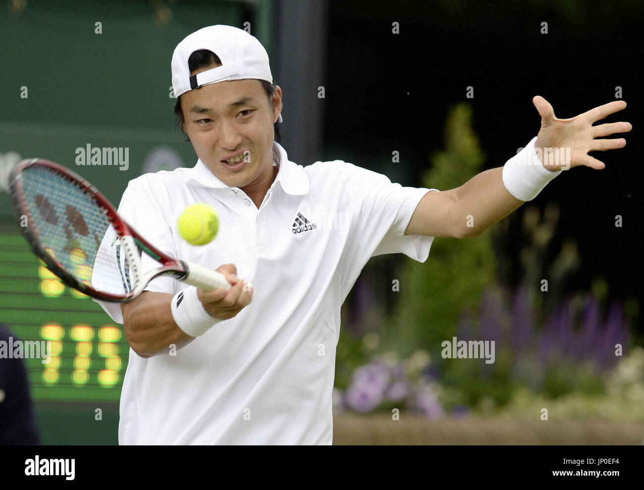 LONDON, United Kingdom - Go Soeda of Japan returns a shot during a ...
