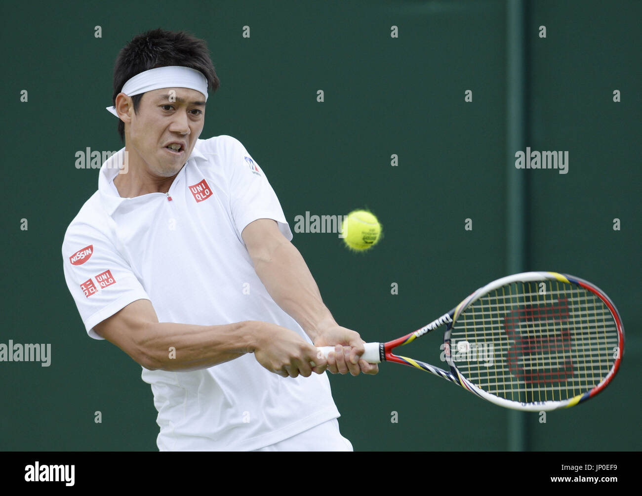 LONDON, United Kingdom - Kei Nishikori of Japan returns a shot during a ...