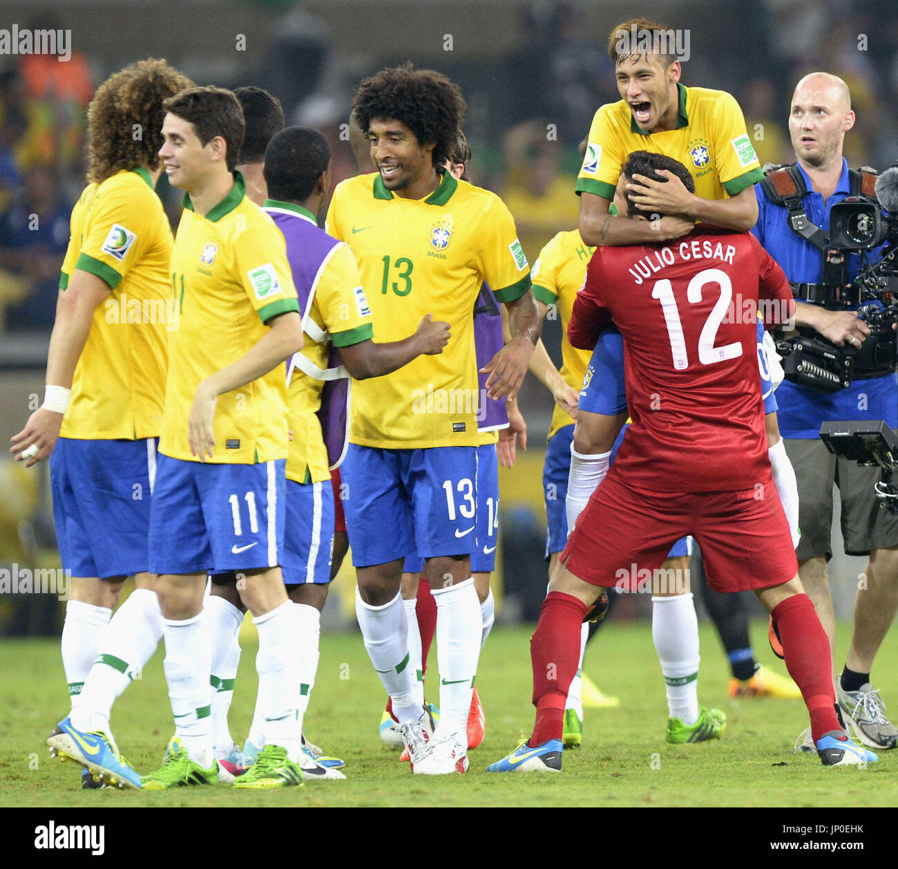 BELO HORIZONTE, Brazil - Brazil goalkeeper Julio Cesar (12) hugs Neymar ...