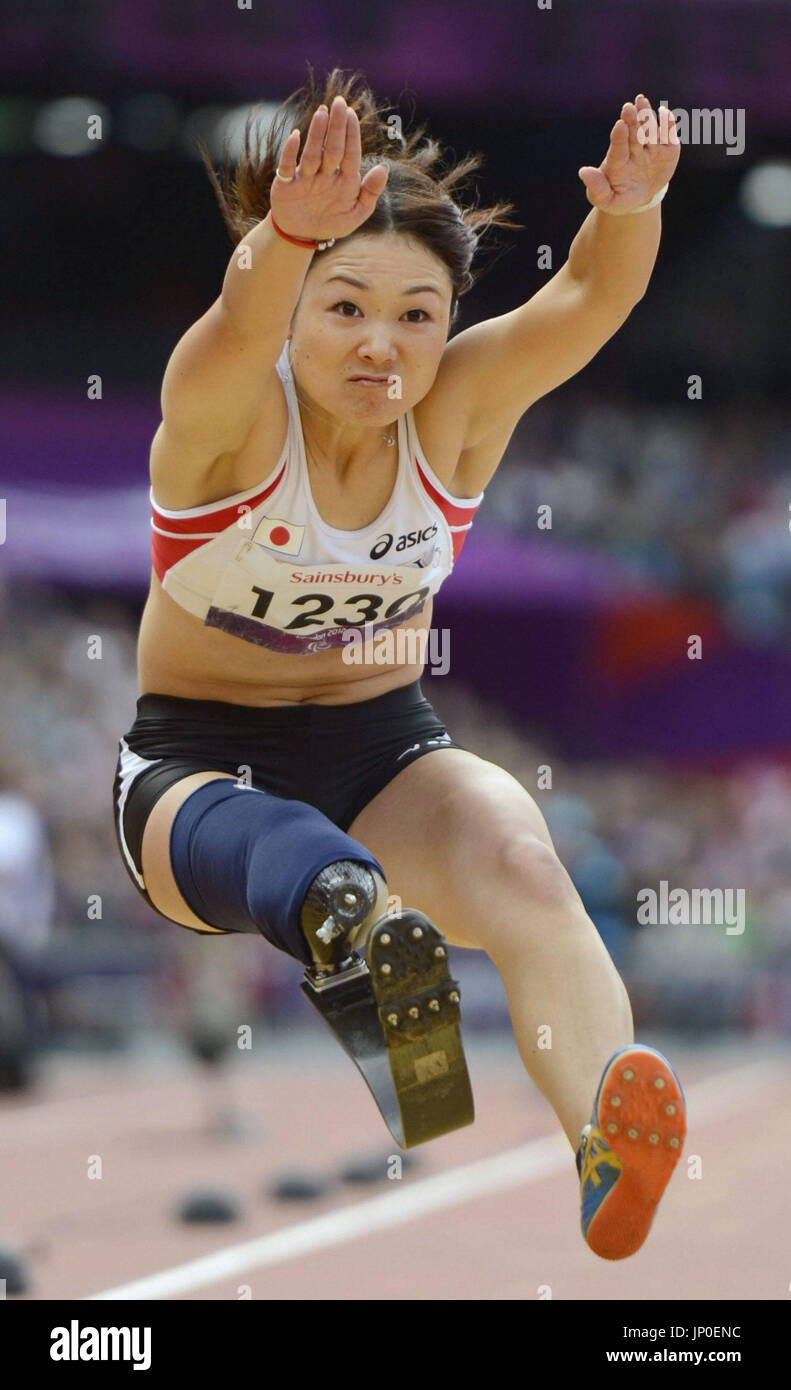 TOKYO, Japan - File photo shows Mami Sato making a leap in the women's ...