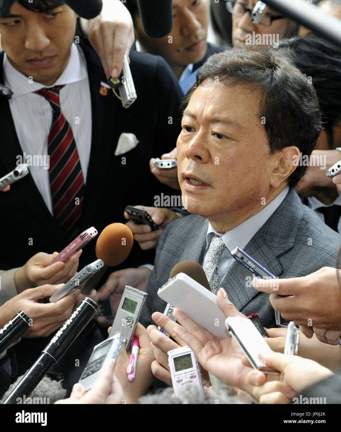 TOKYO, Japan - Tokyo Vice Gov. Naoki Inose is surrounded by reporters ...