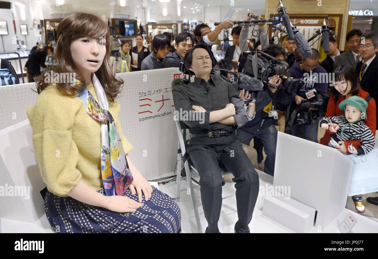 OSAKA, Japan - Photo shows a female humanoid robot called Minami (L ...