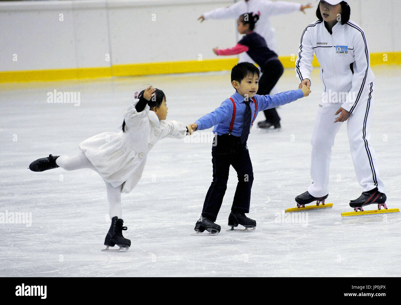 PYONGYANG, North Korea - Children play on a newly built ice-skating ...