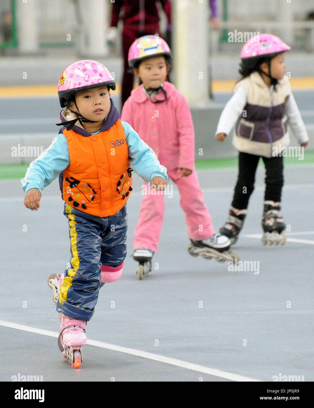 PYONGYANG, North Korea - Children play on a newly built roller-skating ...
