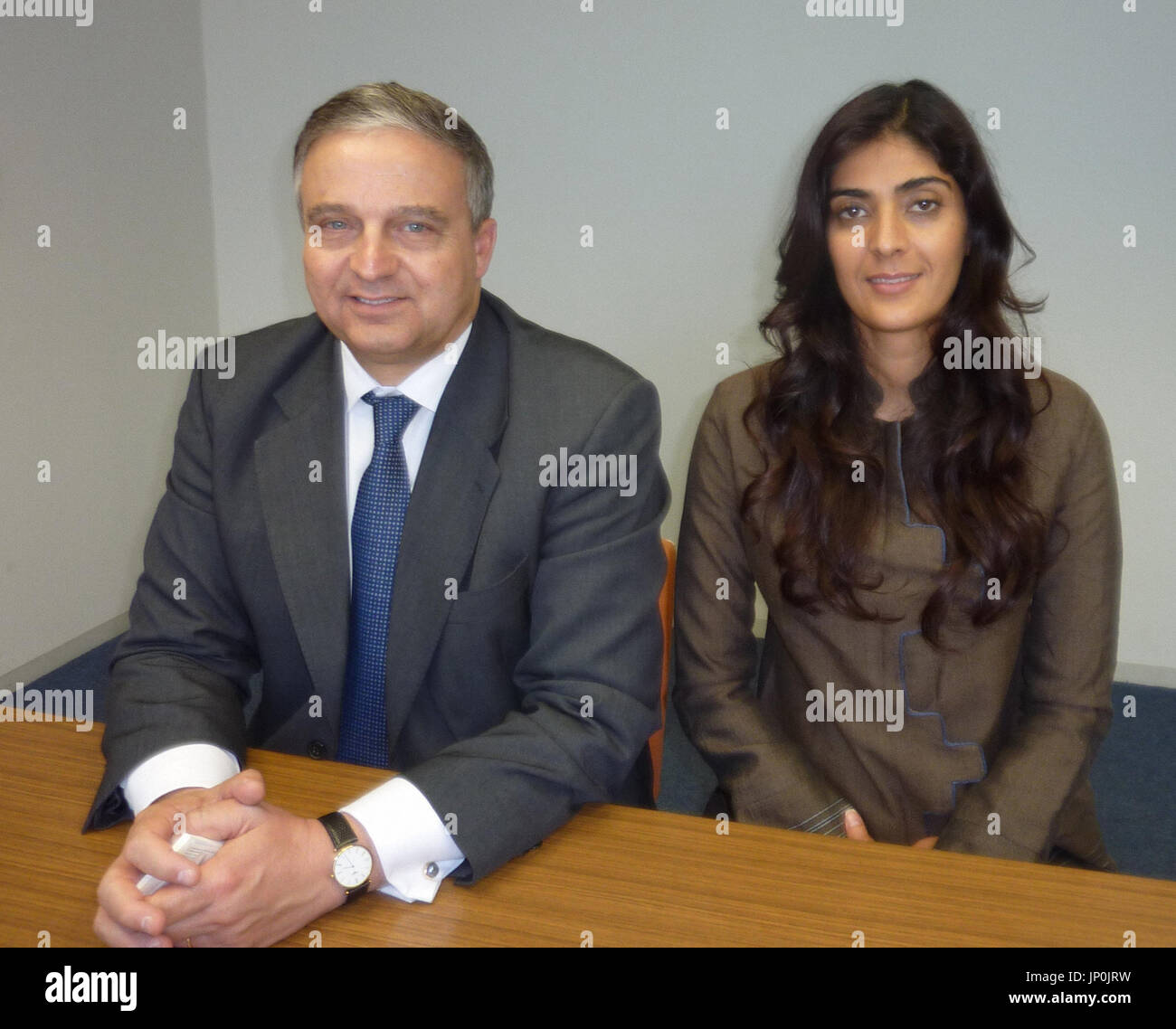 TOKYO, Japan - Laurent Zessler (L), representative of the United Nations Population Fund in ...