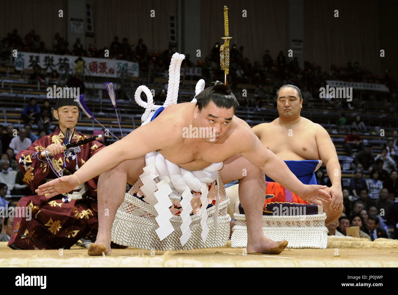 FUKUOKA, Japan - Newly promoted grand champion Harumafuji performs a ...