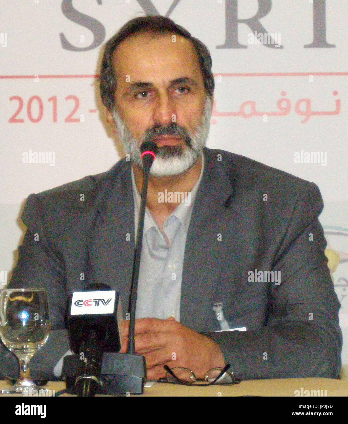DOHA, Qatar - Moaz al-Khatib, head of a new coalition of Syrian ...