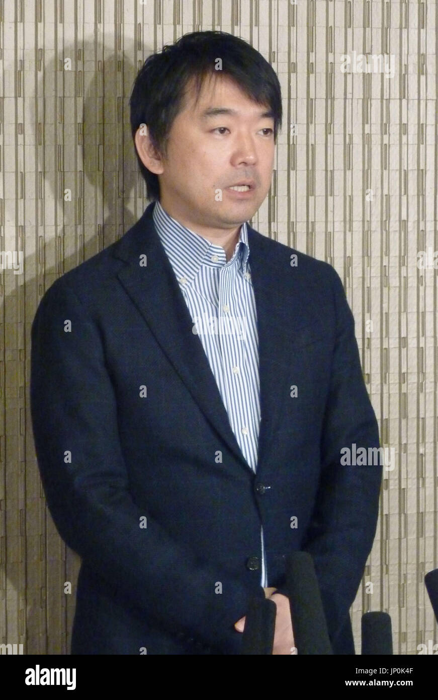 OSAKA, Japan - Osaka Mayor Toru Hashimoto answers reporters' questions ...