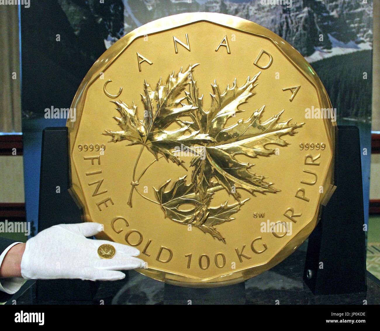 SAPPORO, Japan - A gold coin weighing 100 kilograms is exhibited at a ...