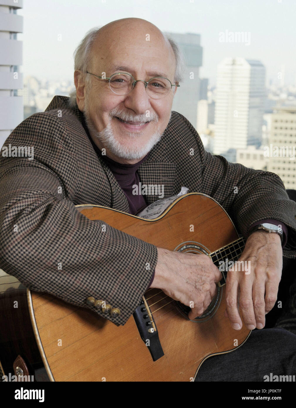 TOKYO, Japan - American musician Peter Yarrow answers a reporter's ...