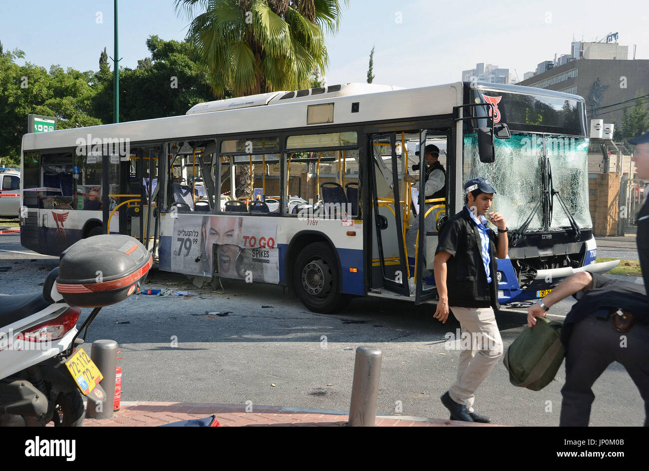 TEL AVIV, Israel - Photo shows a bus destroyed after a bomb exploded ...
