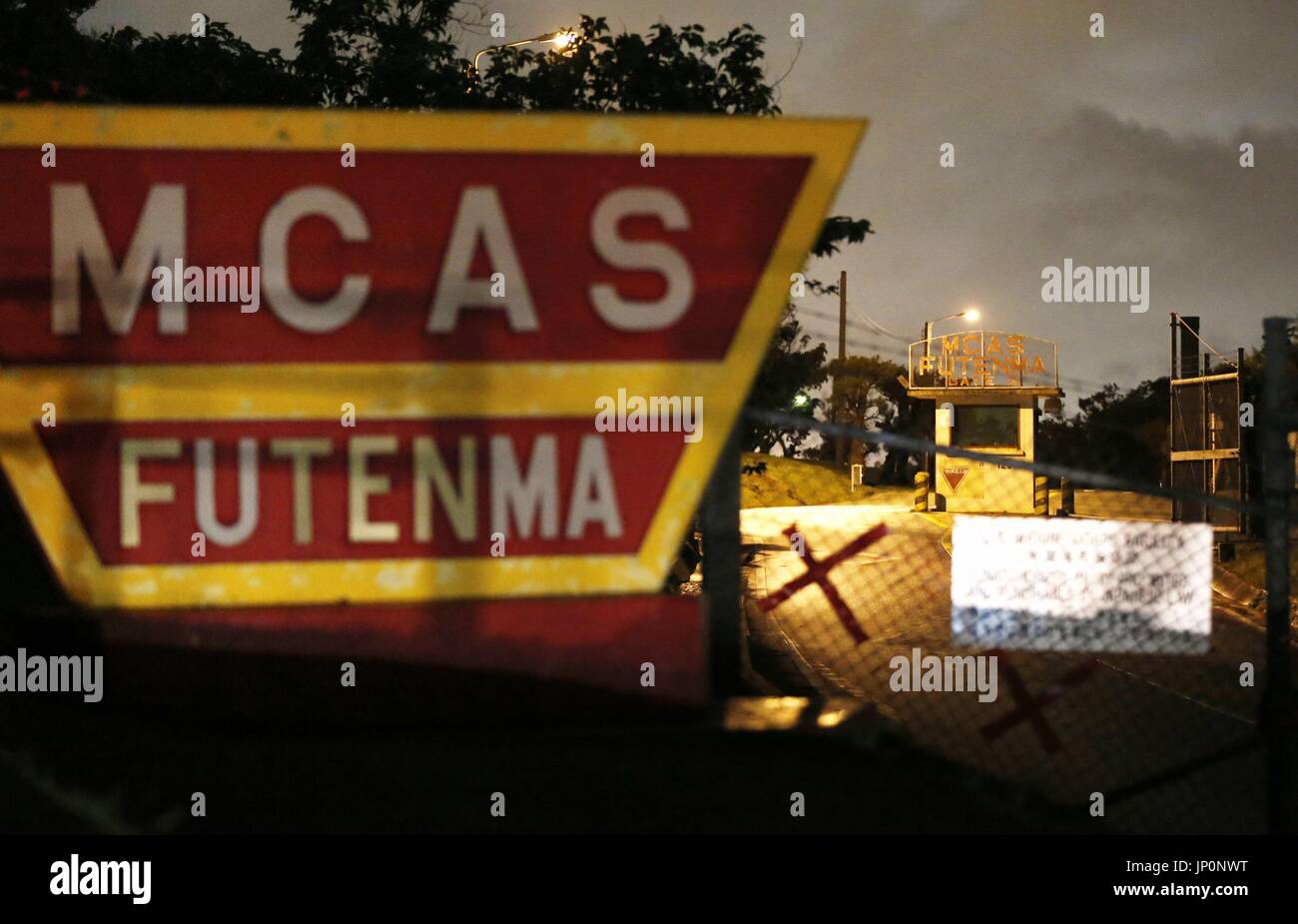 GINOWAN, Japan - Photo shows a gate at the U.S. Marine Corps' Futenma Air Station in Okinawa ...