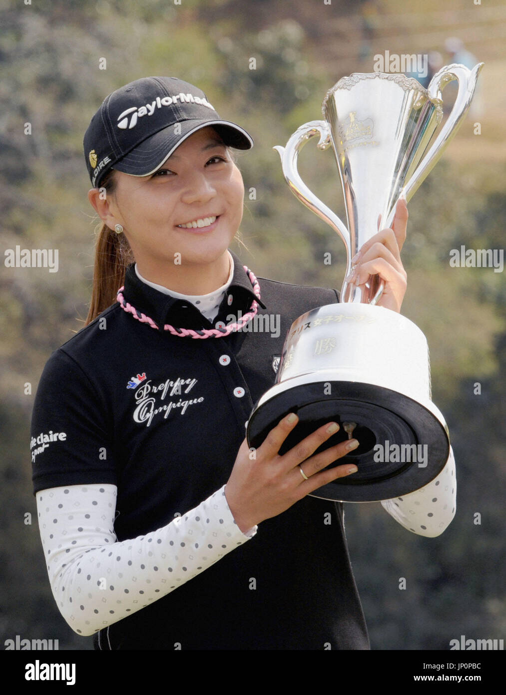 MIKI, Japan - Kim Na Ri of South Korea holds the victor's trophy after ...
