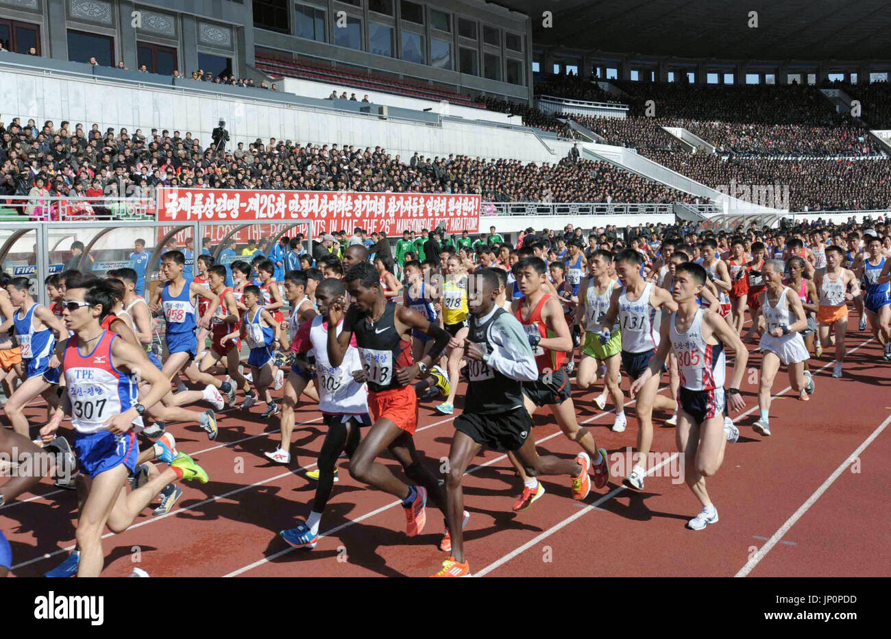 PYONGYANG, North Korea - Runners start an international marathon from a ...