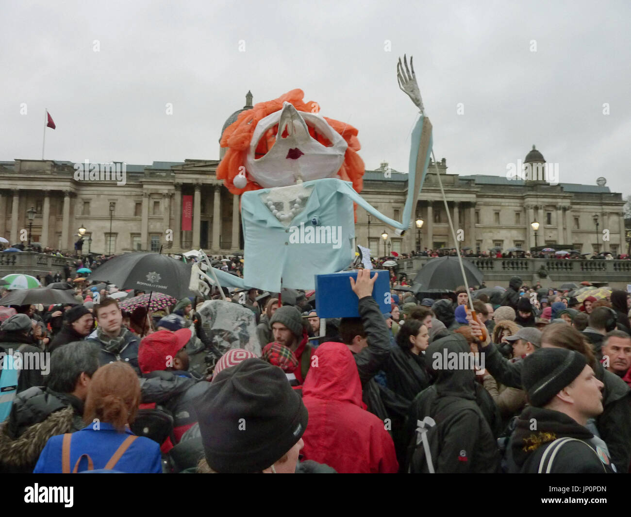 LONDON, Britain - People hoist a skeleton-like doll of former British ...