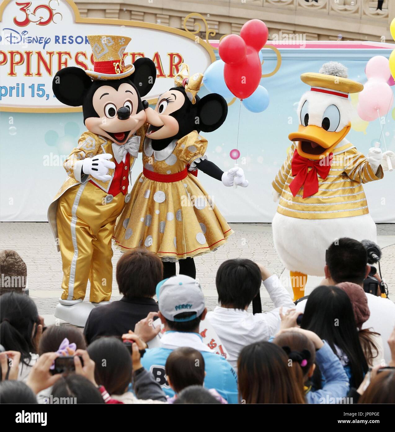 TOKYO, Japan - Popular characters including Mickey Mouse (L) pose for ...