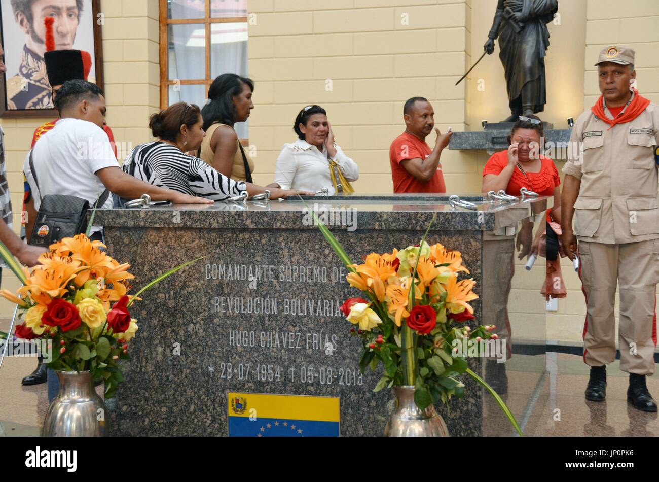 CARACAS, Venezuela - Supporters visit the stone tomb of former ...