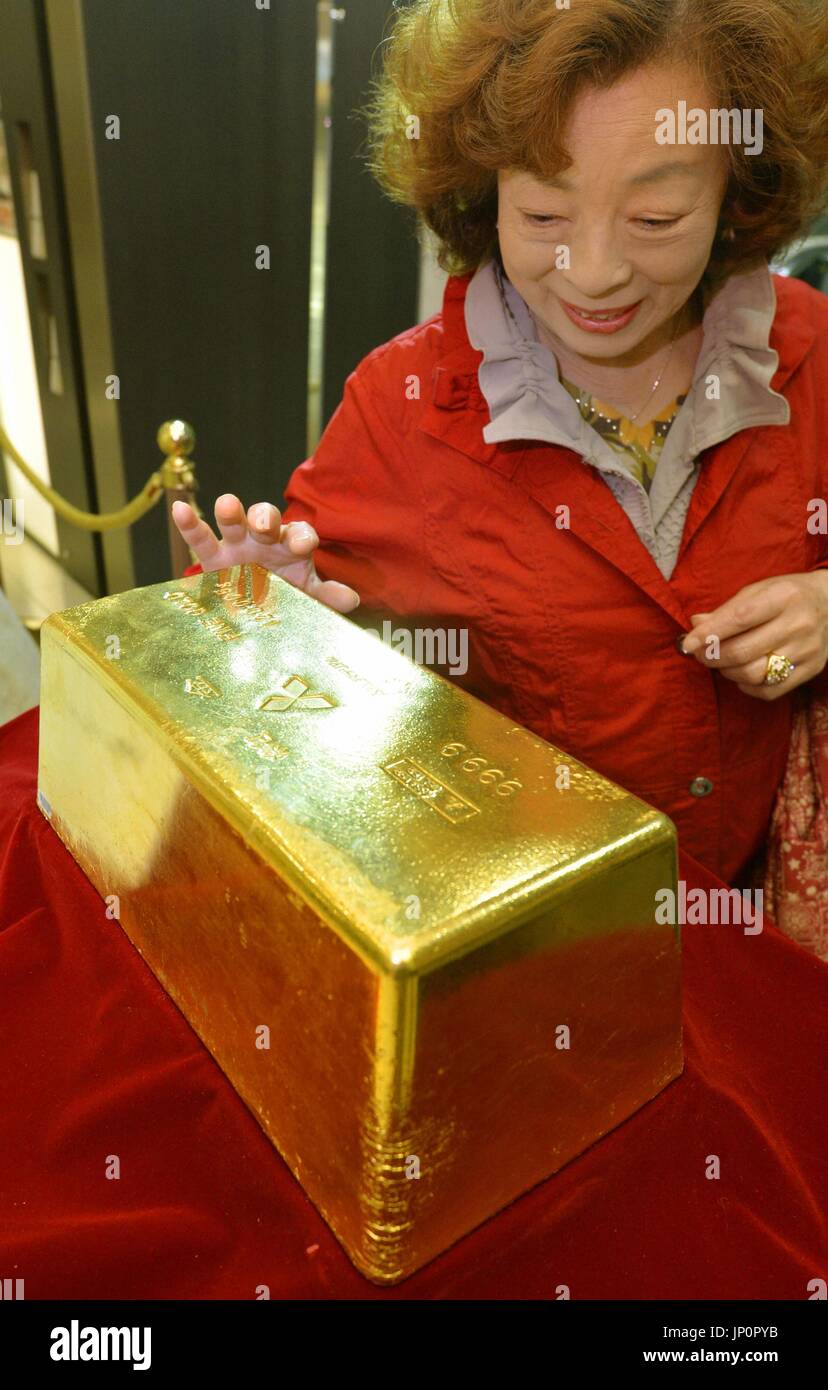 TOKYO, Japan - A shopper at Takashimaya department store in Tokyo's ...
