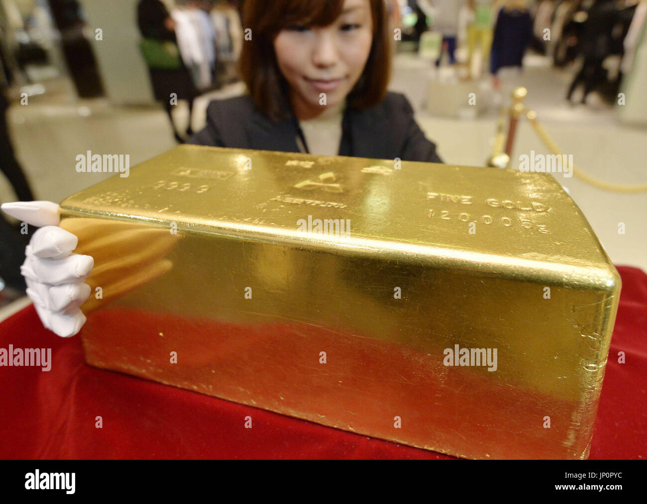 TOKYO, Japan - Photo shows a piece of gold bullion, weighing 120 kilograms and worth 600 million ...