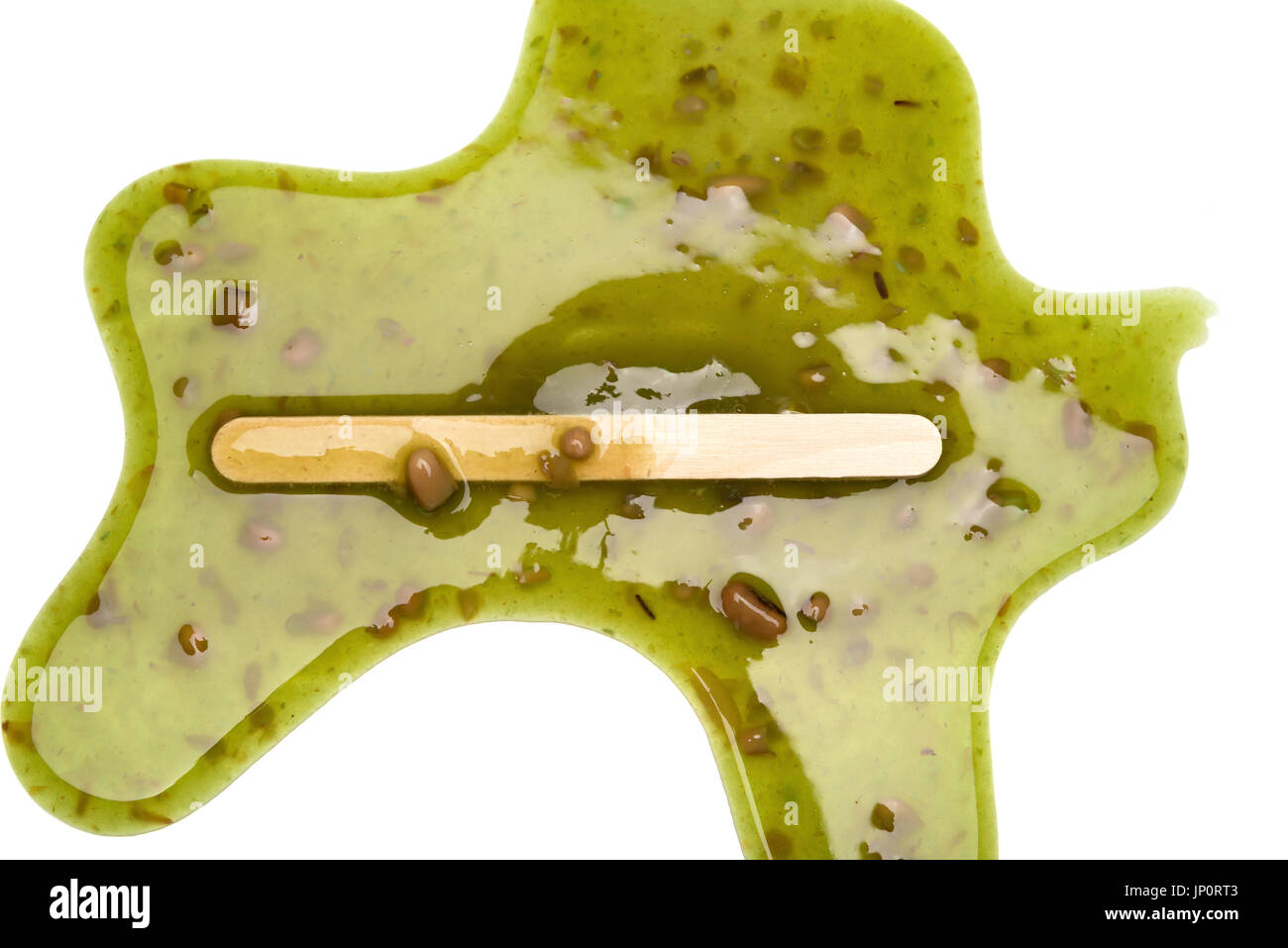 green bean popsicle completely melted on a white background Stock Photo ...