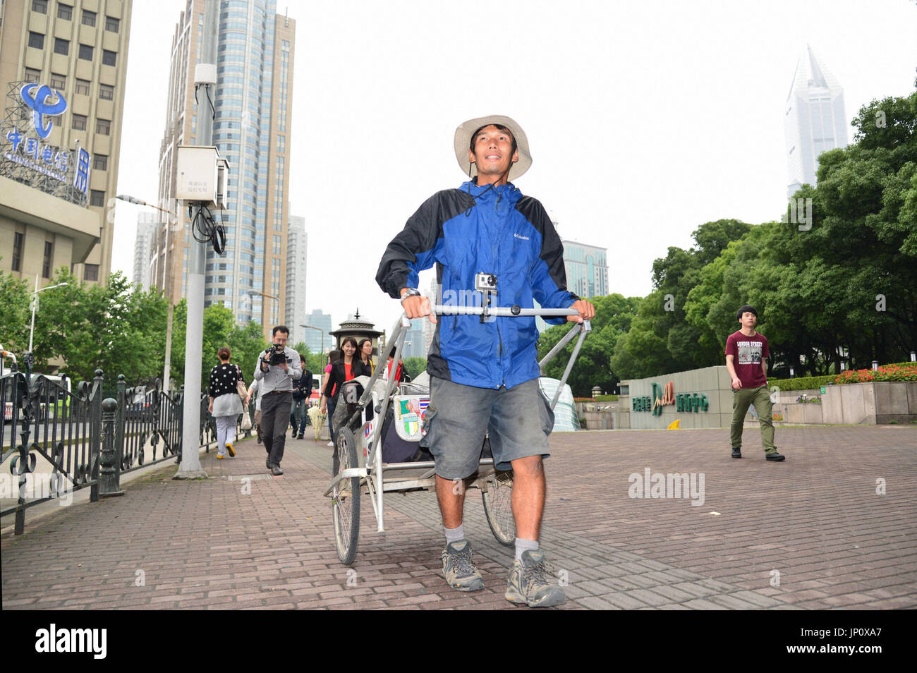 SHANGHAI, China - Japan's Masahito Yoshida nears the endpoint in ...