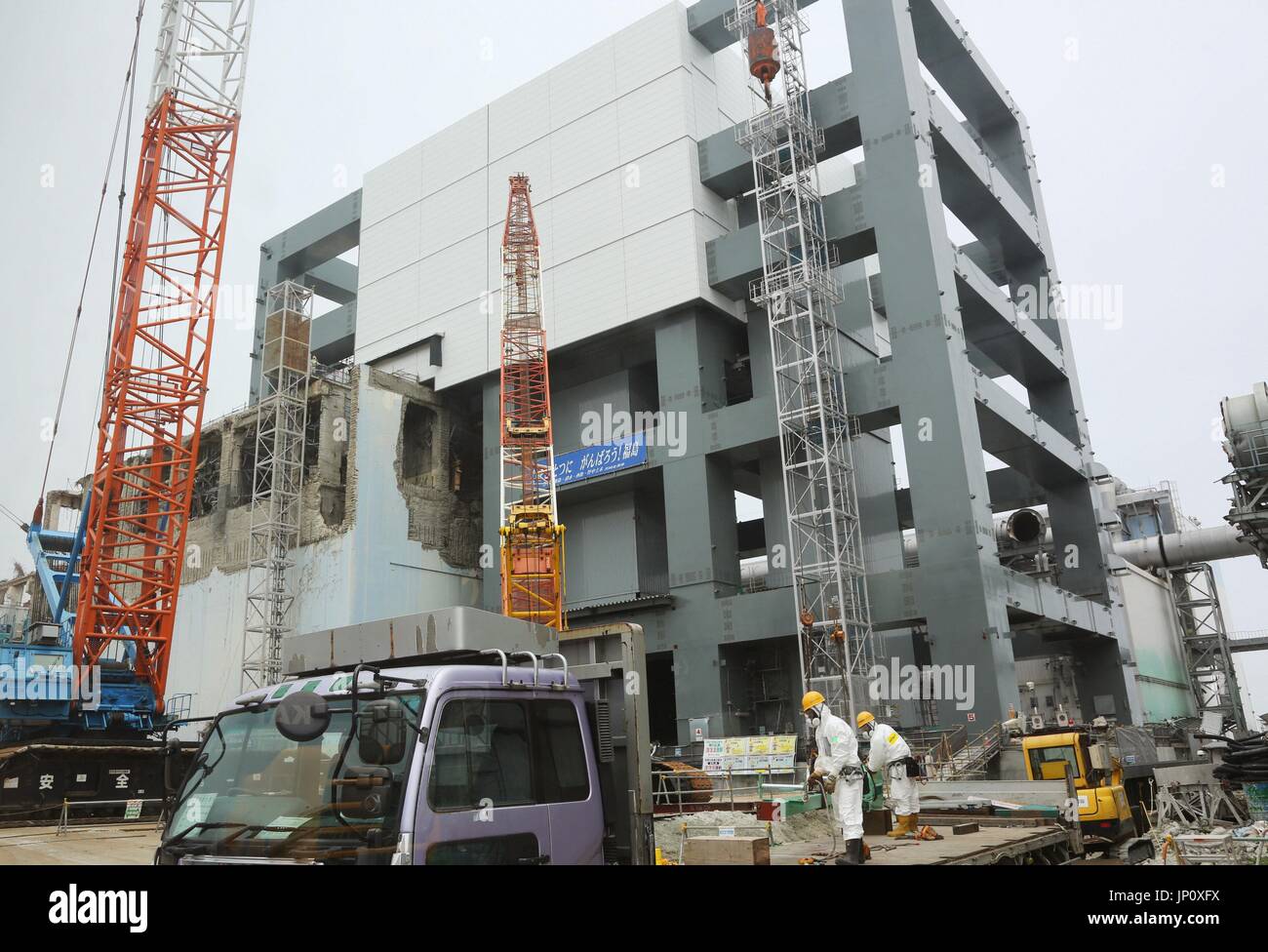 FUKUSHIMA, Japan - Photo shows the No. 4 reactor (L) and the framework ...