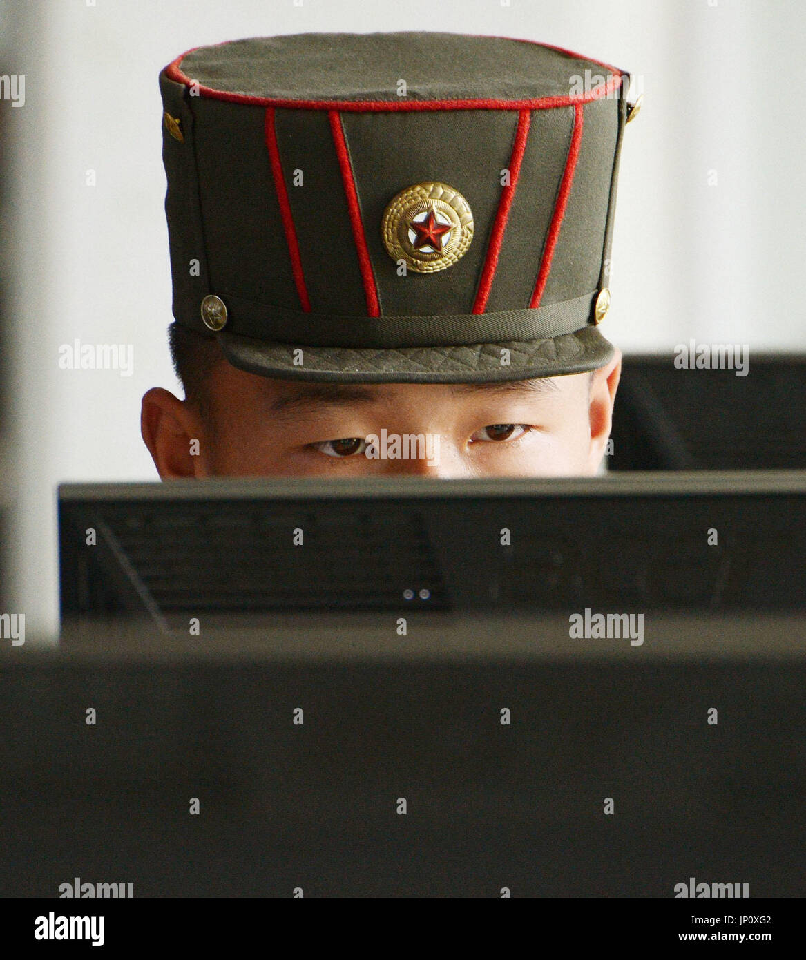 PYONGYANG, North Korea - A cadet uses a computer at Mangyongdae ...