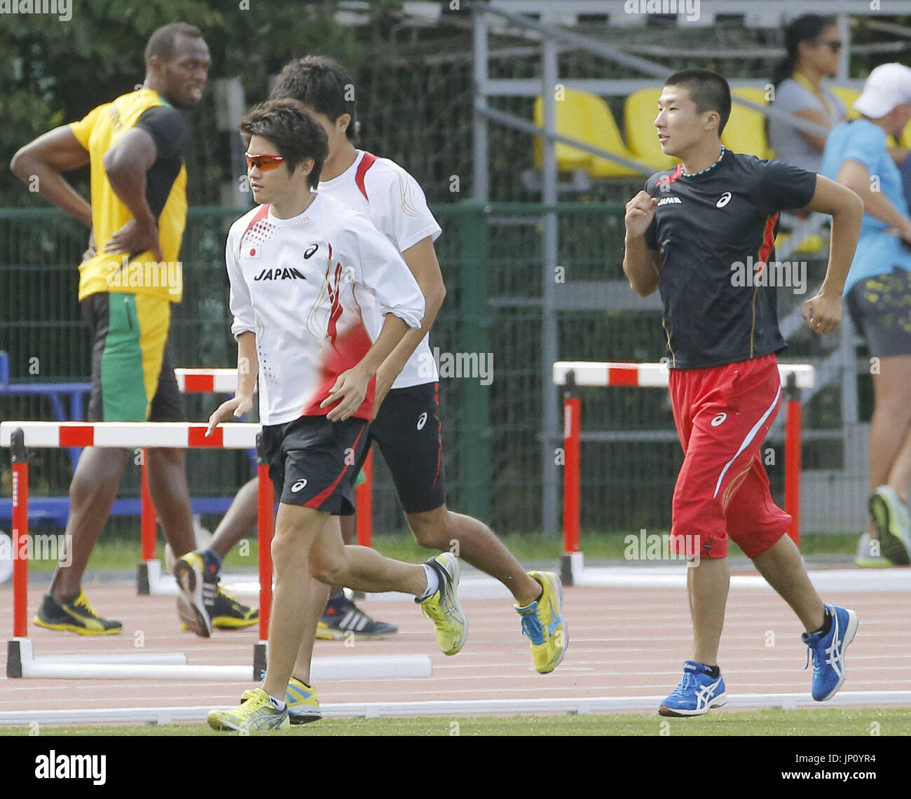 MOSCOW, Russia - Japanese high school sprinter Yoshihide Kiryu (far R ...