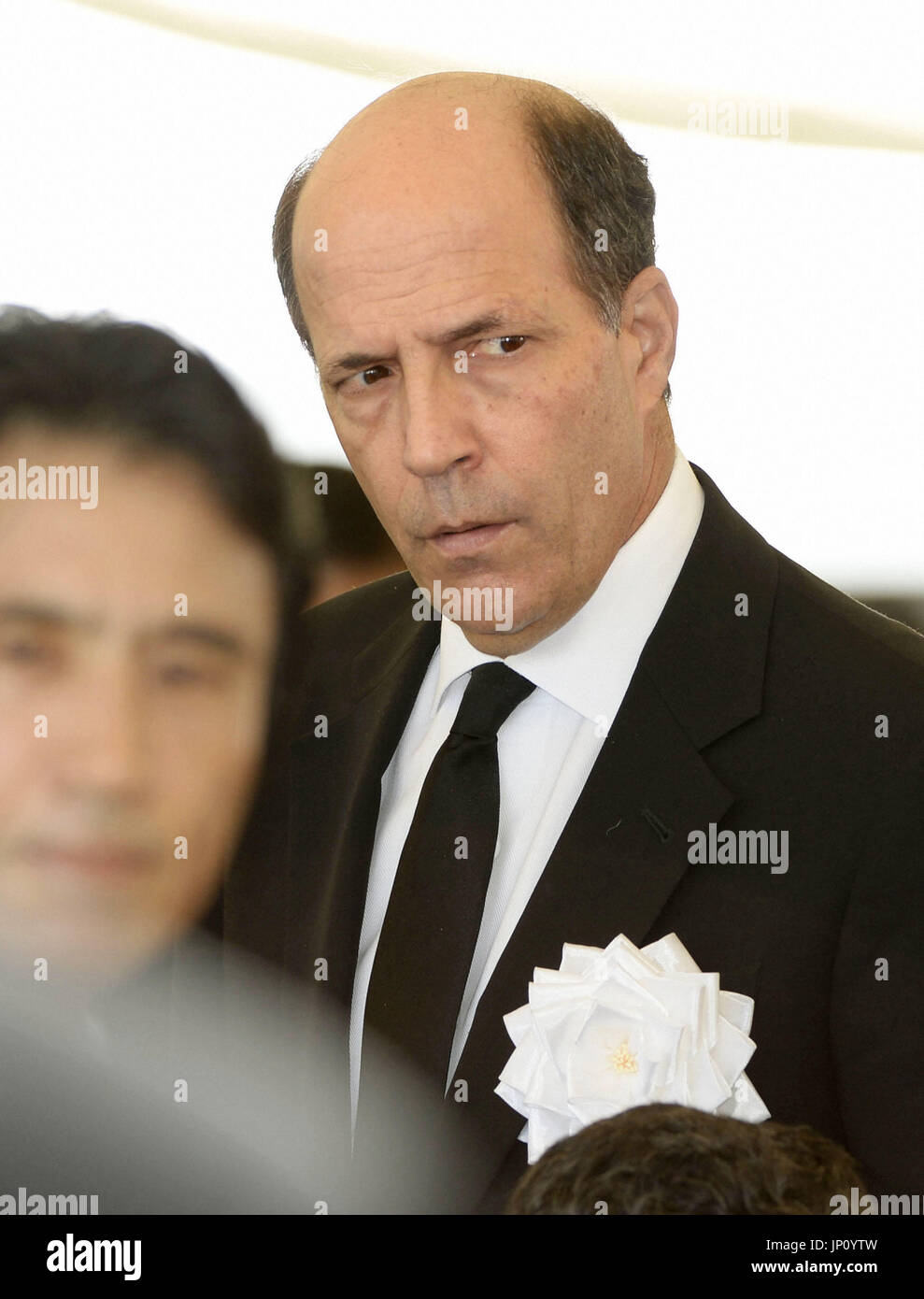 NAGASAKI, Japan - U.S. Ambassador to Japan John Roos attends a ceremony ...