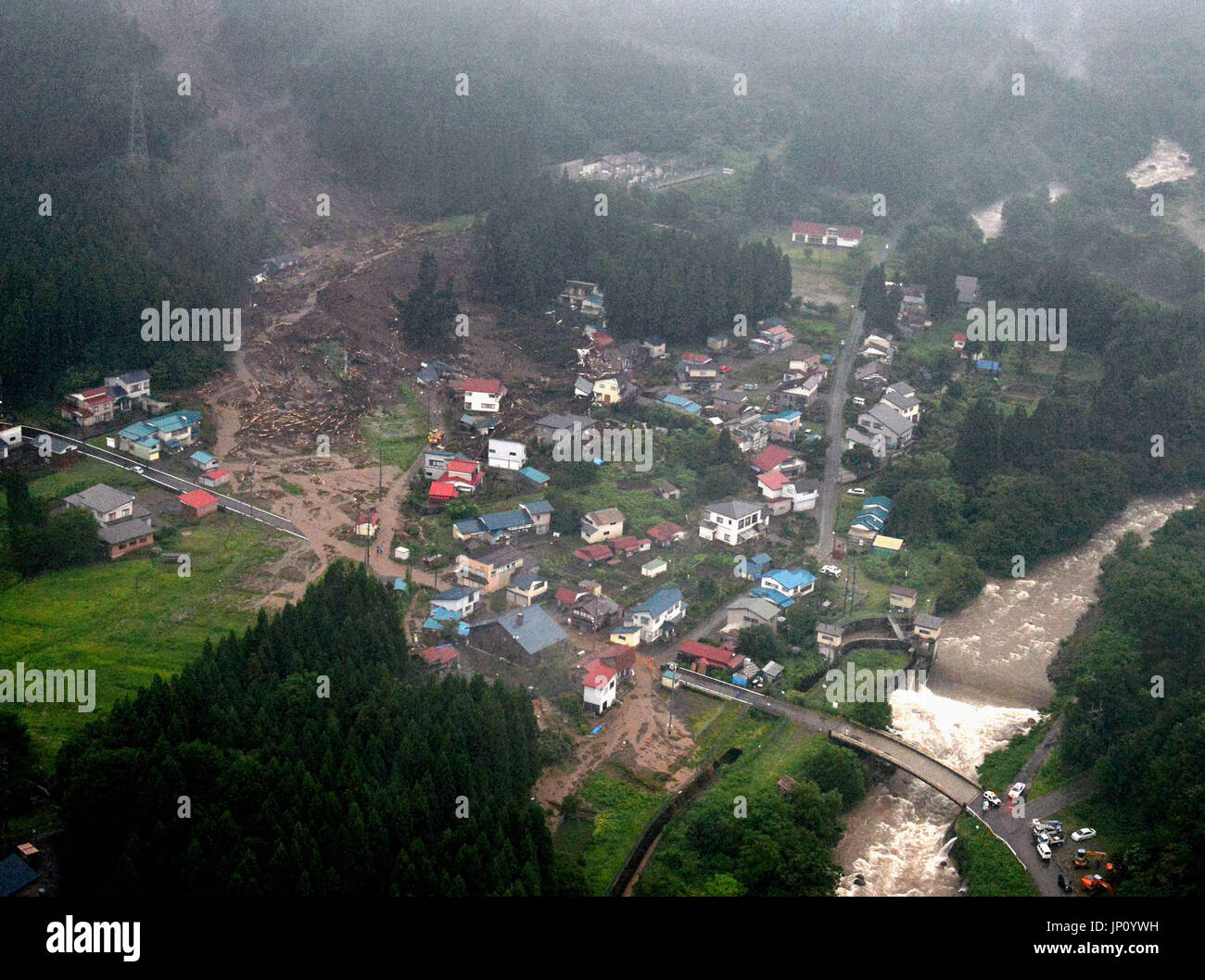 TOKYO, Japan - Photo from a Kyodo News airplane shows a residential ...