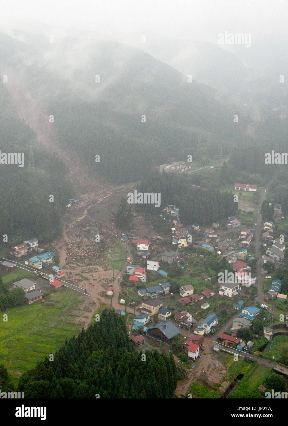 TOKYO, Japan - Photo from a Kyodo News airplane shows a residential ...